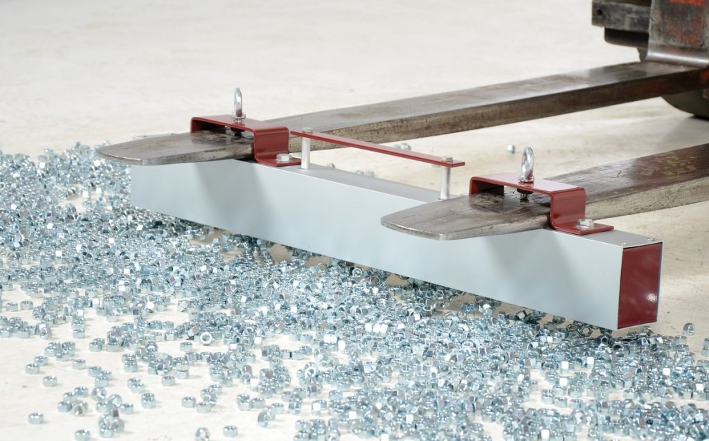 Cleaning Indoors and Outdoors with a Forklift Sweeper ...